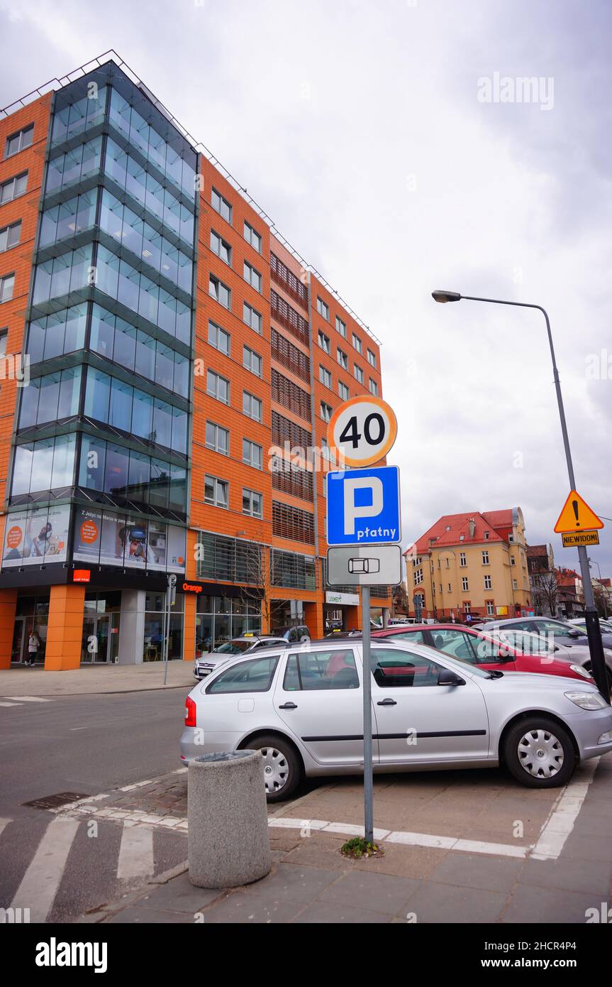 Line of parked cars in front of the Globis office building on ...