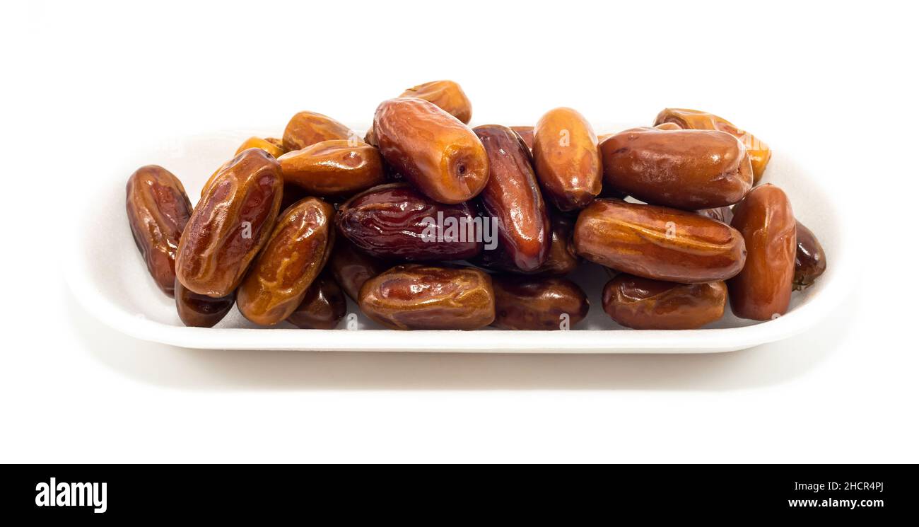 Dates in a white organic box on a white background. Date isolate Stock ...