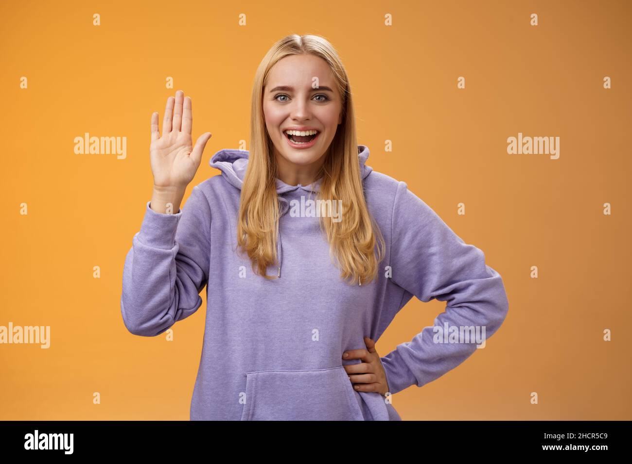 Friendly energized helpful charming female student say hello newcomers ...