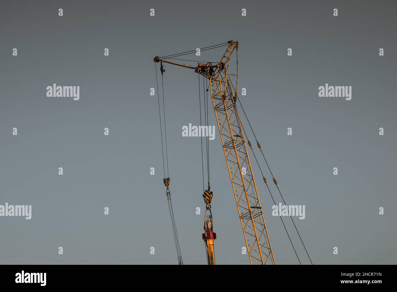 Orange boom lift hi-res stock photography and images - Alamy