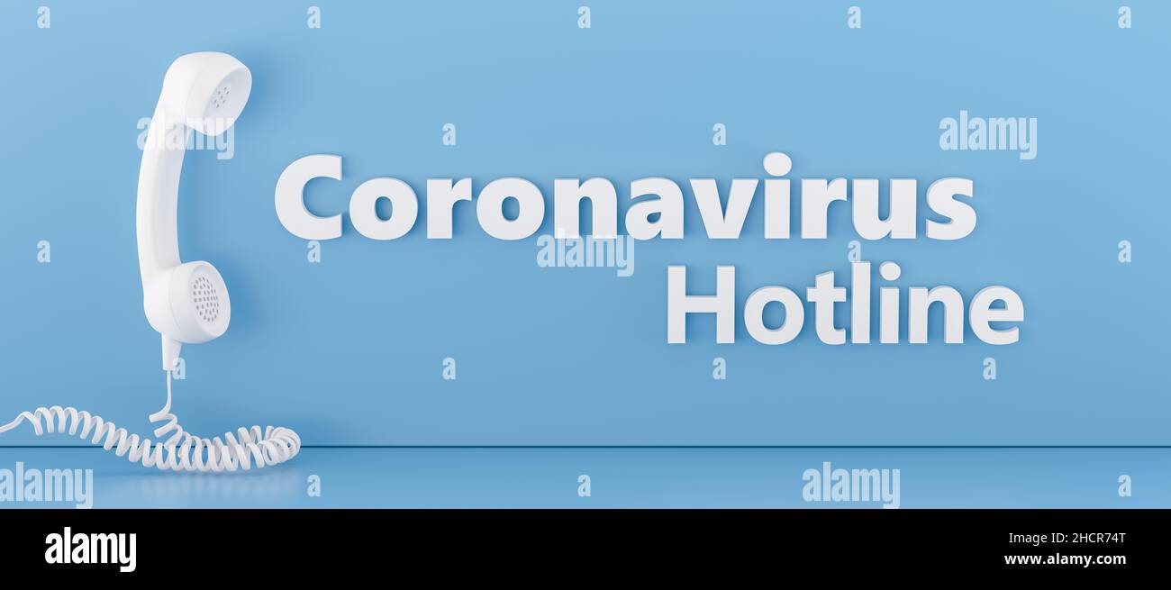 Hotline Landline telephone in front of a color wall background. Corona ...