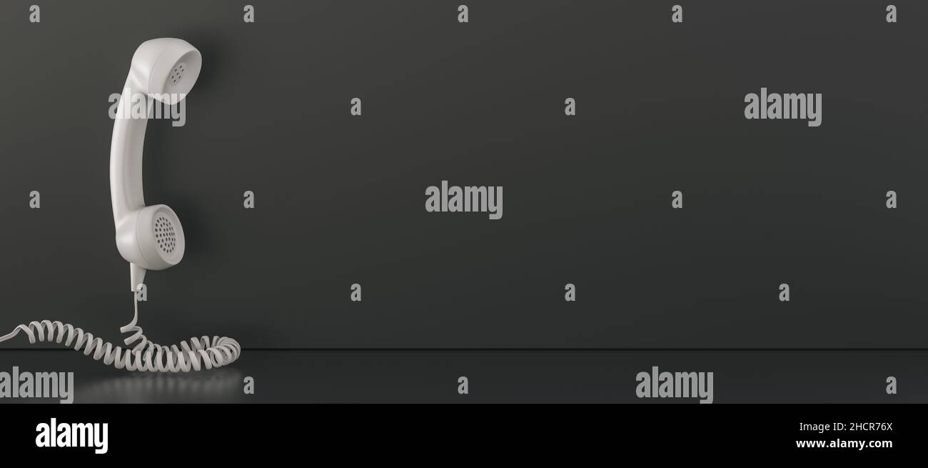 Shot of a white landline telephone receiver with copy space for ...