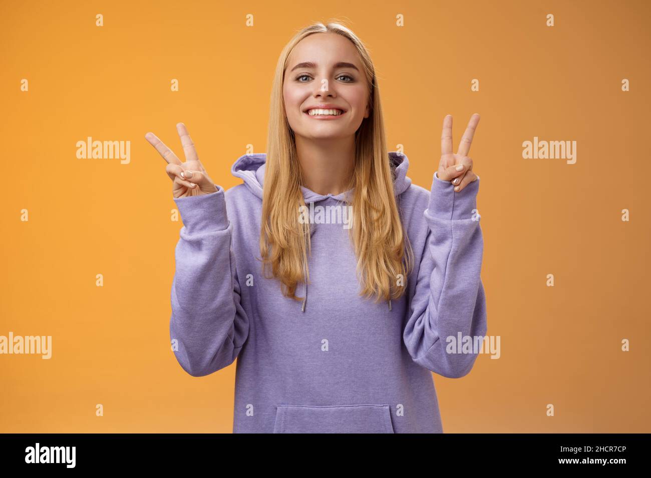 Peaceful glad attractive blond european young female college student in ...