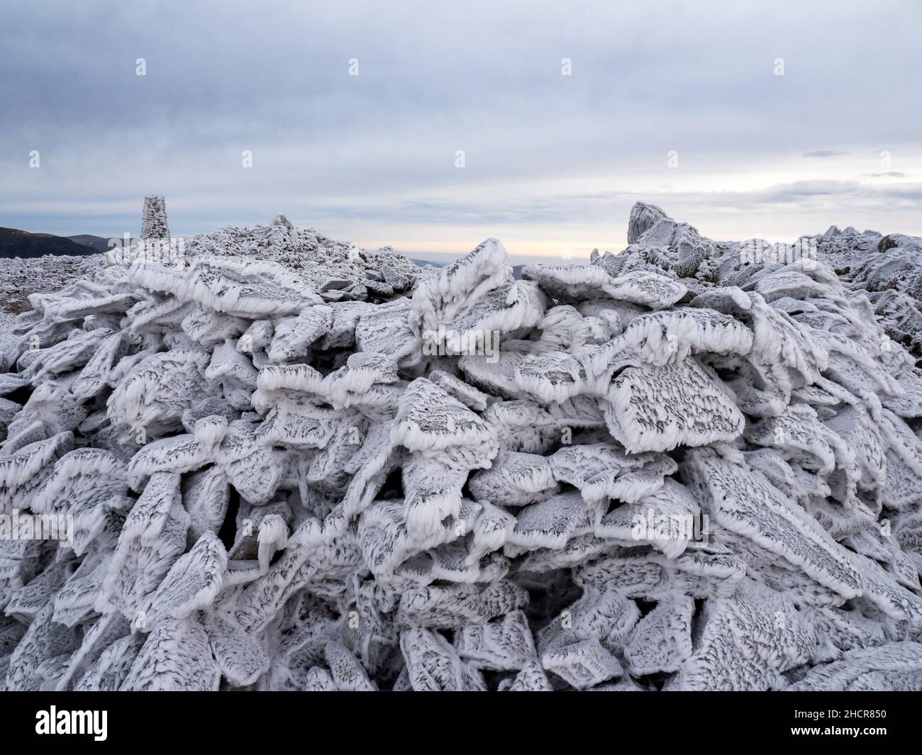 The summit of Red Screes covered by hoar frost at dawn Lake District UK ...