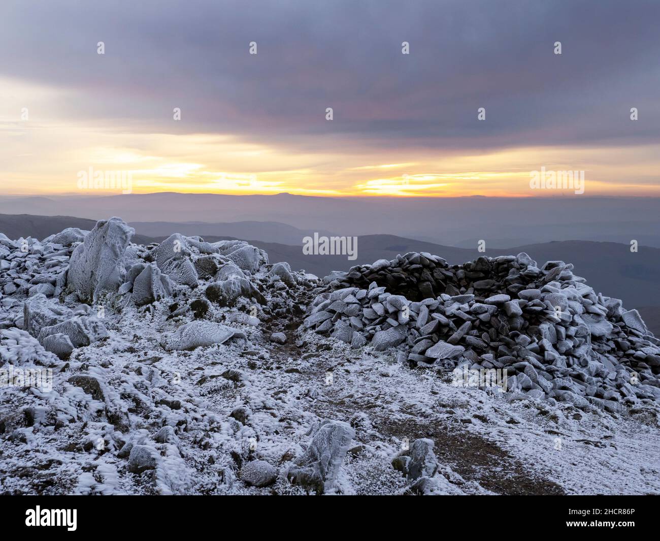 The summit of Red Screes covered by hoar frost at dawn Lake District UK ...