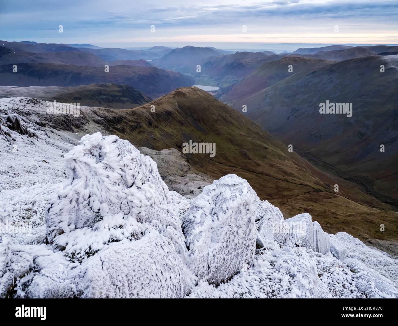 The summit of Red Screes covered by hoar frost, looking down into ...