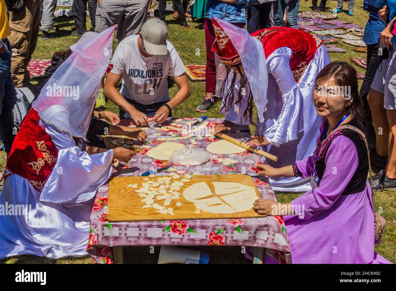 SONG KOL, KYRGYZSTAN - JULY 25, 2018: Cooking of boorsok, fried dough ...