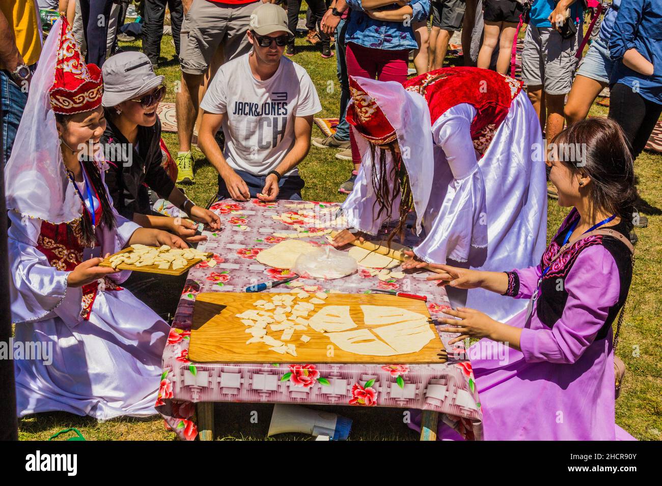 SONG KOL, KYRGYZSTAN - JULY 25, 2018: Cooking of boorsok, fried dough ...