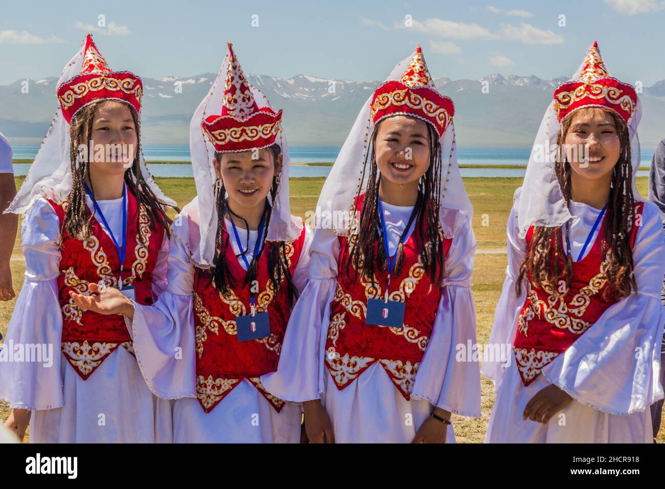 SONG KOL, KYRGYZSTAN - JULY 25, 2018: Traditional dress wearing girls ...
