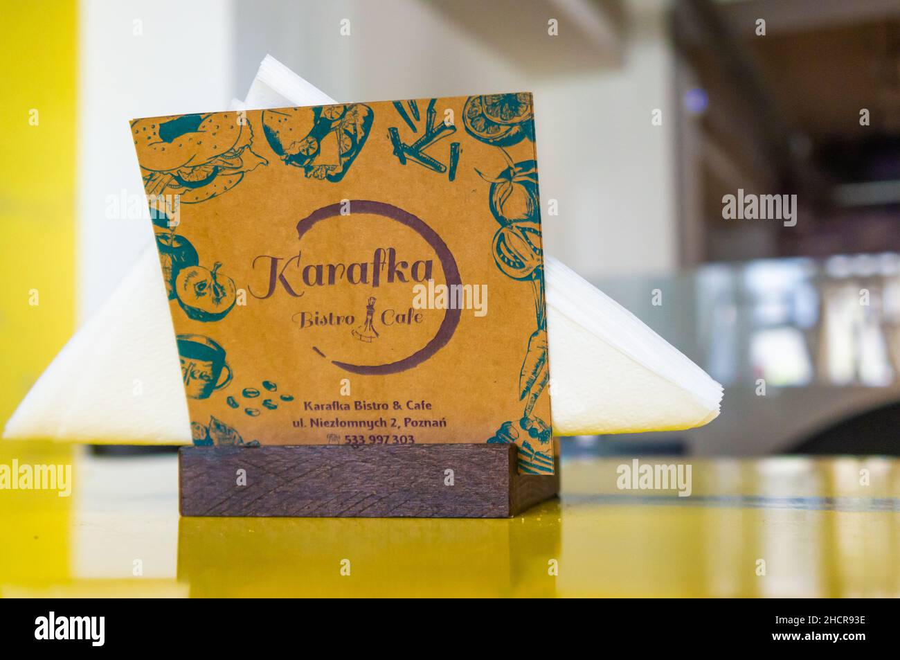 Menu card standing on a table of a cafe Stock Photo - Alamy