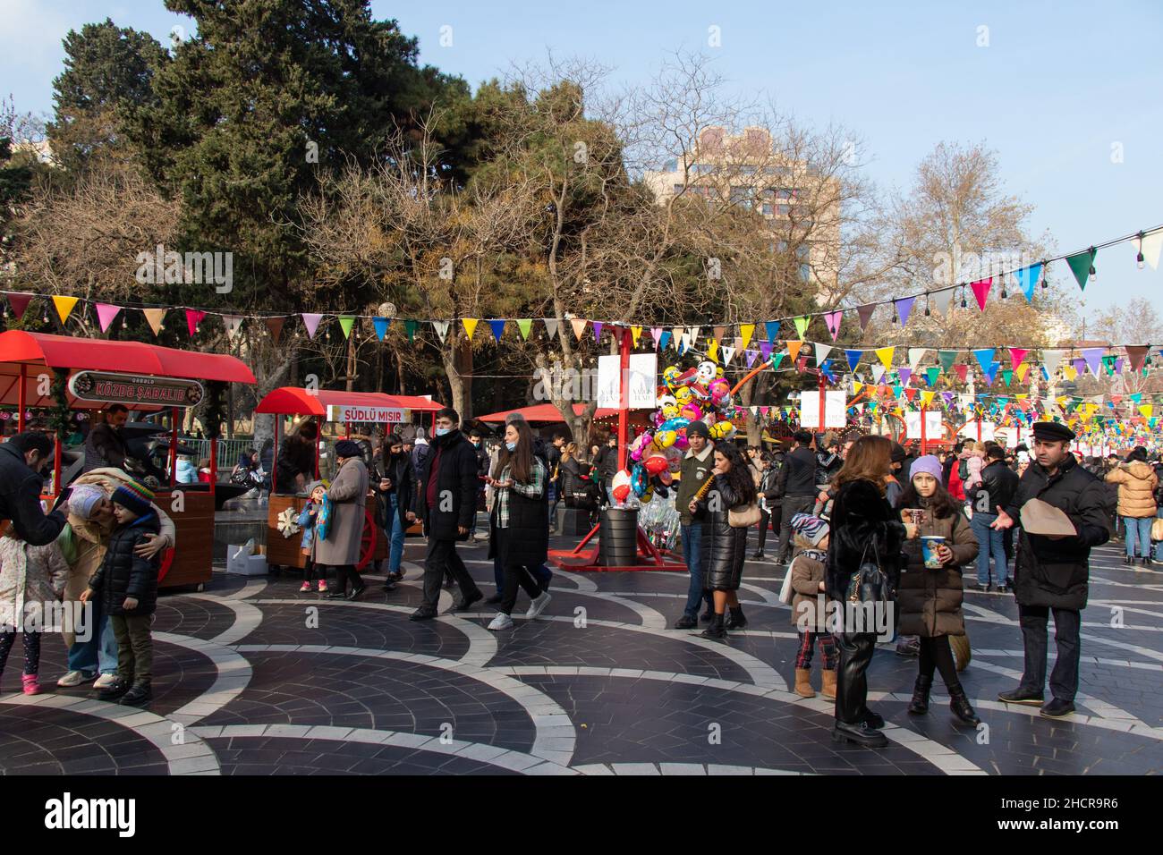 Happy people celebrating the holiday. Christmas day in the central ...