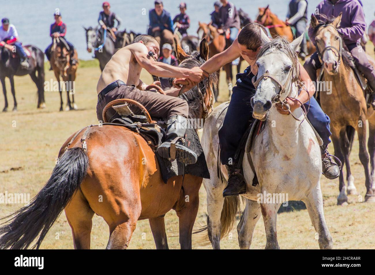 SONG KOL, KYRGYZSTAN - JULY 25, 2018: Horseback wrestling at the ...