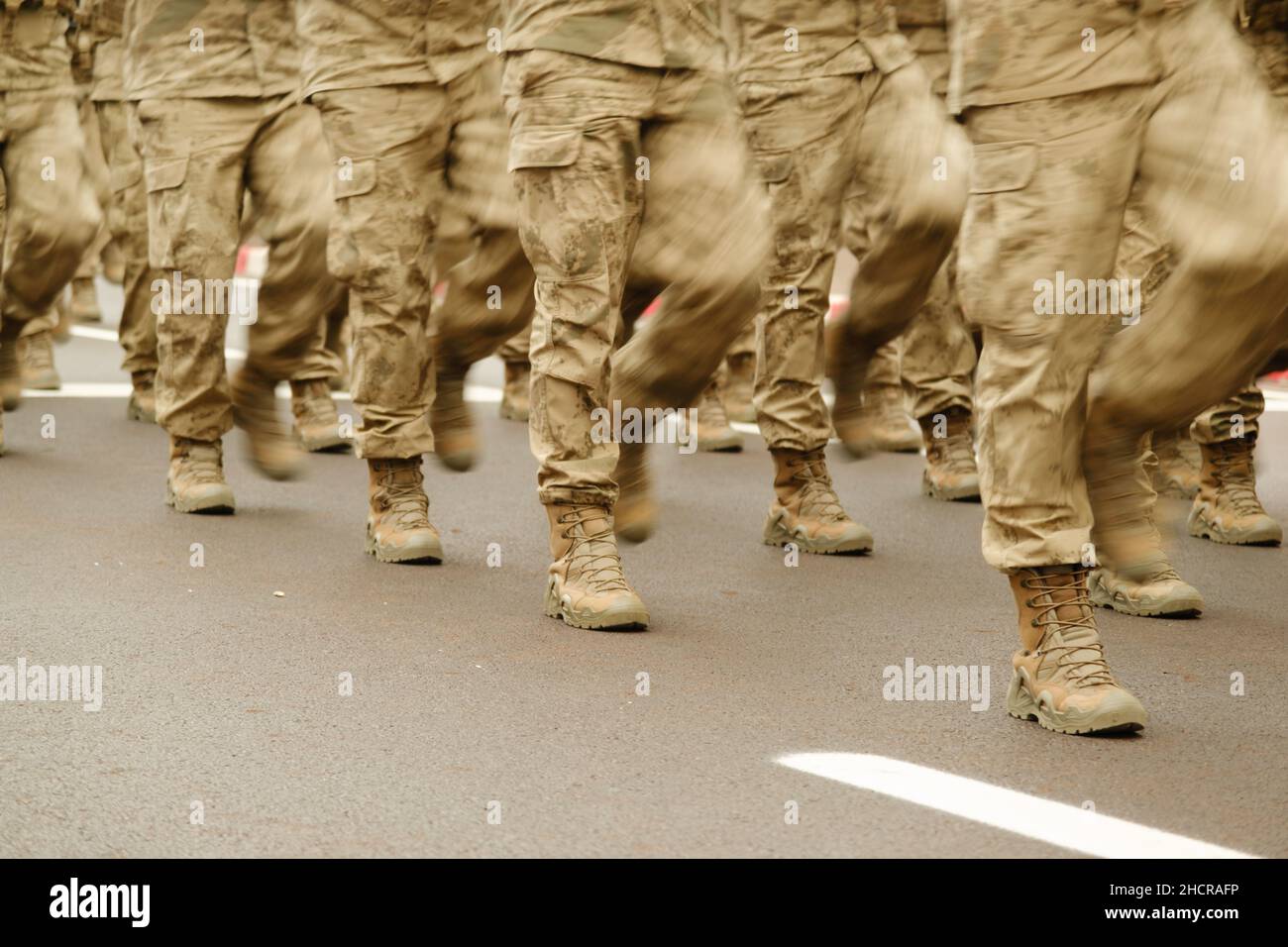 Feet of soldiers marching. Soldier's military boots Stock Photo - Alamy