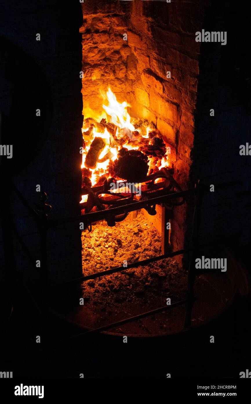 flames of roaring coal fire in a fire place at Beamish Village Stock ...