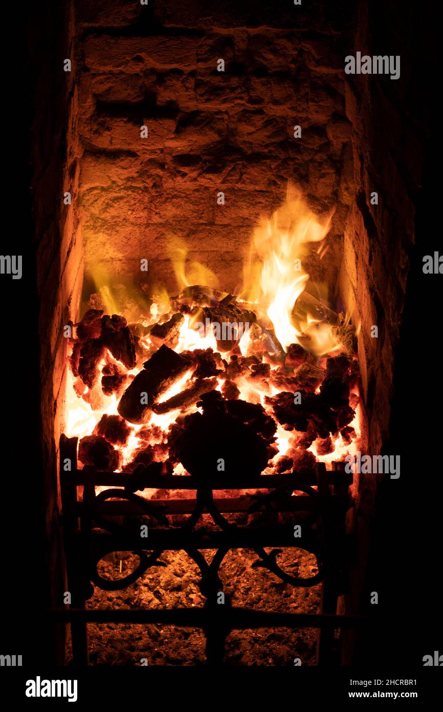flames of roaring coal fire in a fire place at Beamish Village Stock ...