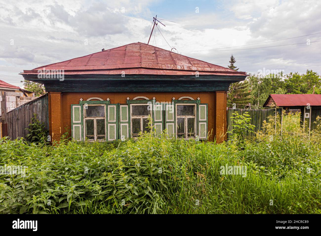 Typical old Russian wooden house in Tyumen city, Russia Stock Photo - Alamy