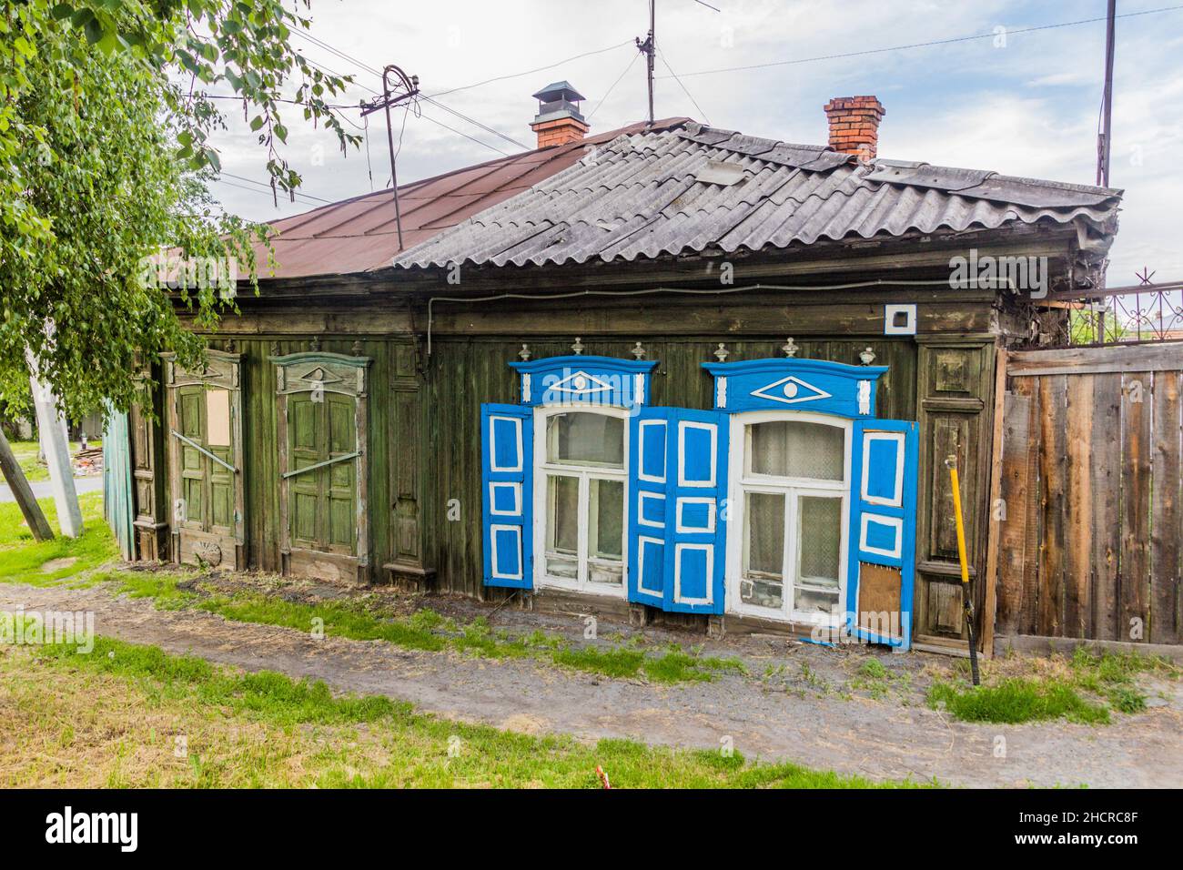 Typical old Russian wooden house in Tyumen city, Russia Stock Photo - Alamy