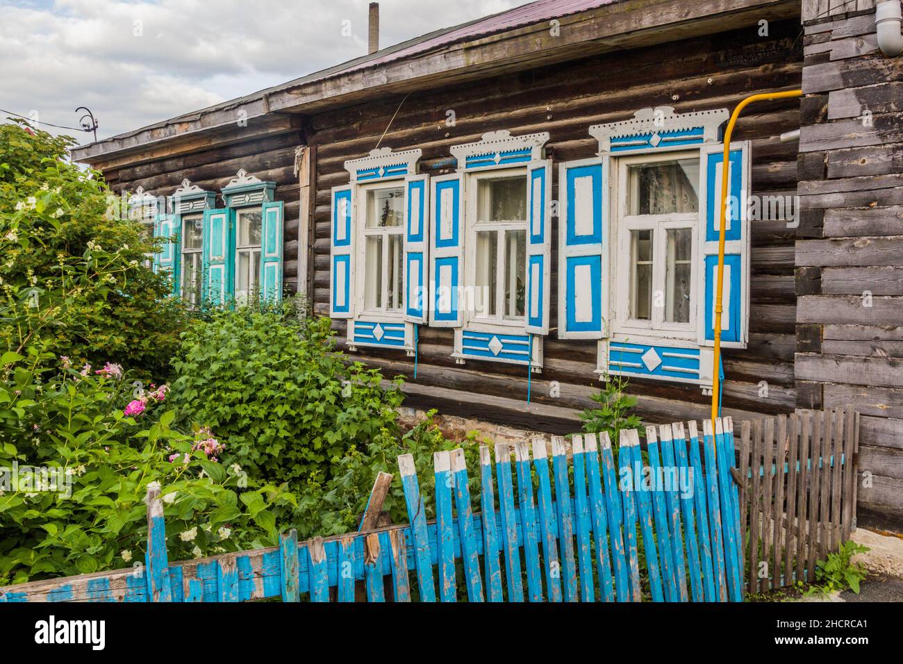Typical old Russian wooden house in Tyumen city, Russia Stock Photo - Alamy
