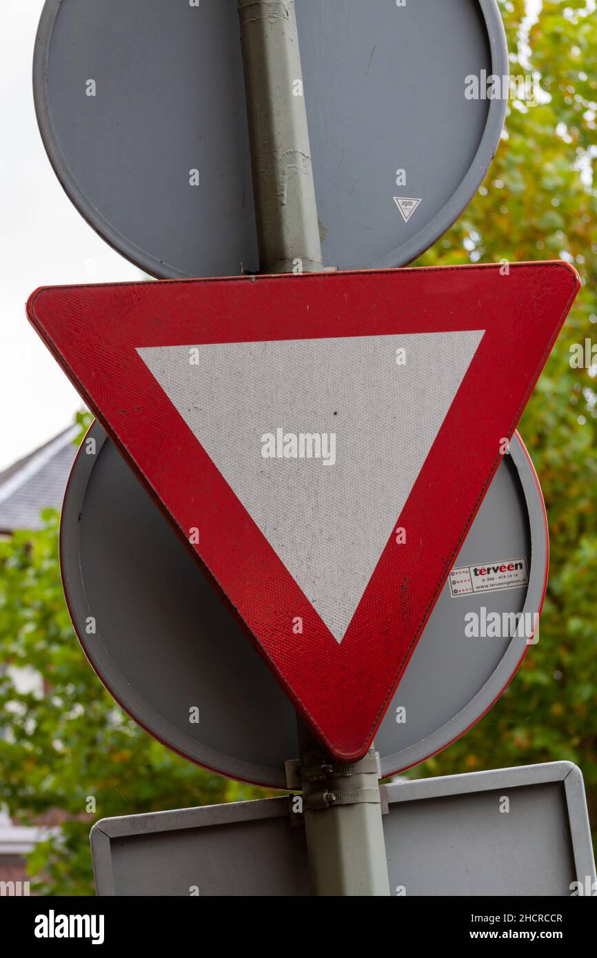 Vertical shot of a "Yield" sign Stock Photo - Alamy