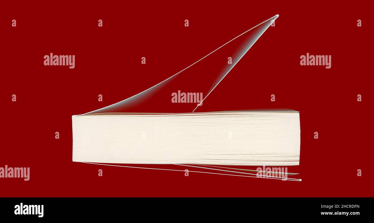 Elegant partially open book over red background Stock Photo - Alamy