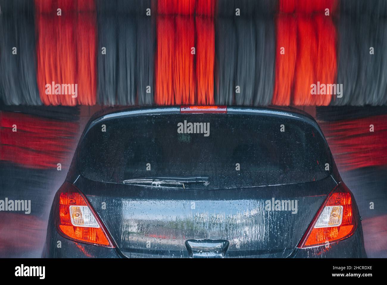 car wash foam water, Automatic car wash brushes in action Stock Photo ...