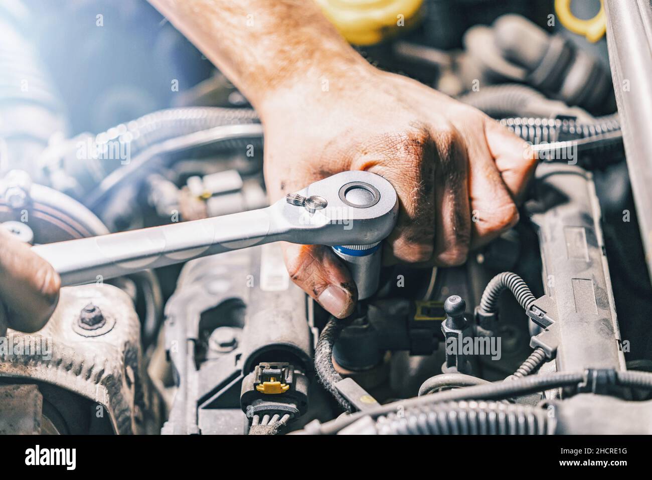 Mechanic hands in blue hi-res stock photography and images - Alamy