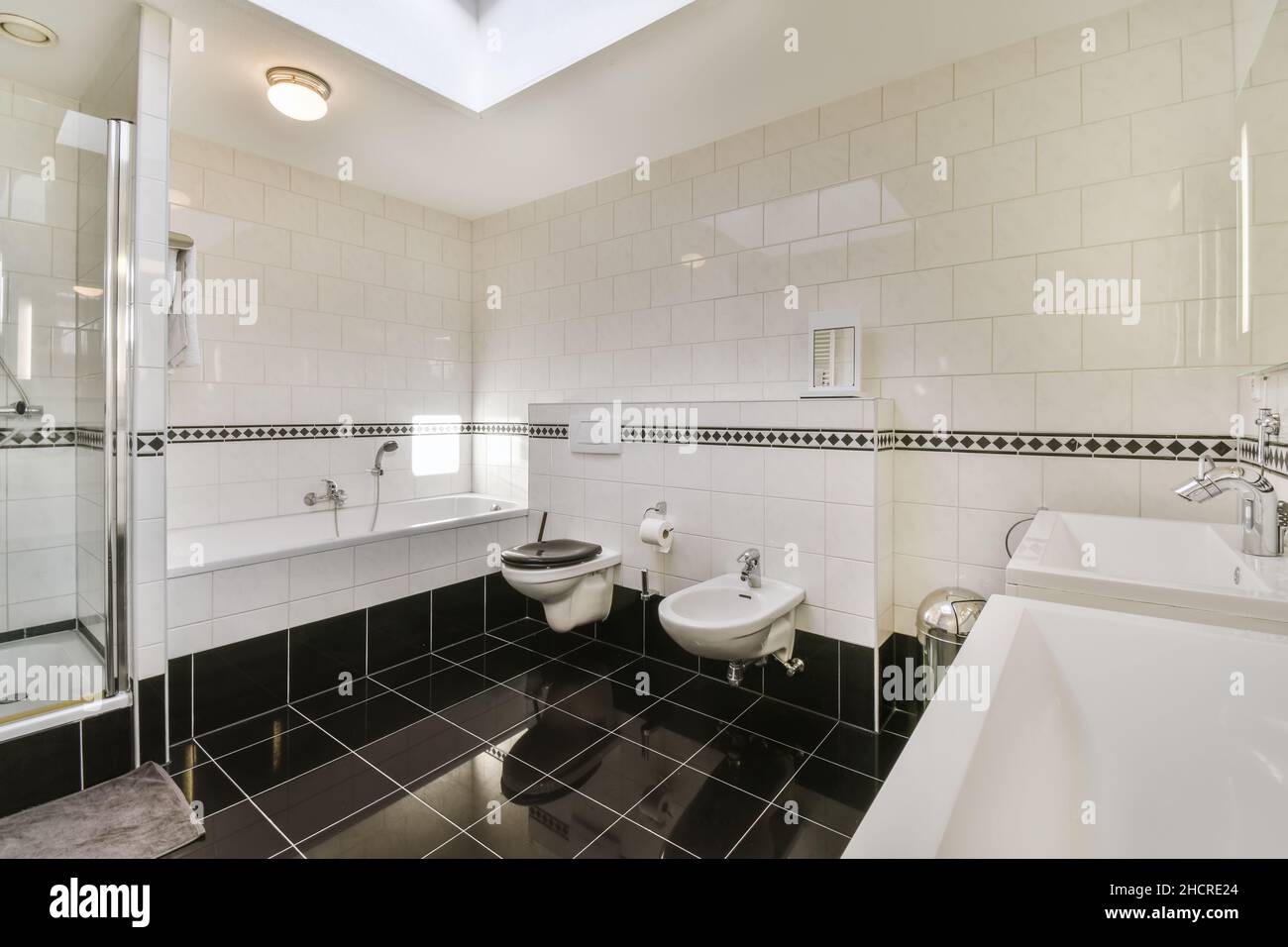 Interior of small clean restroom in miniature style Stock Photo - Alamy