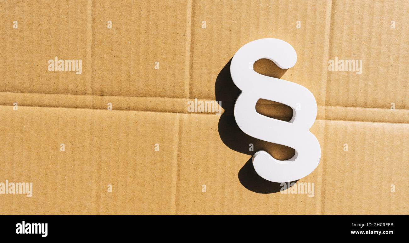 white Paragraph sign on a carton background - Symbol of Law and Justice ...