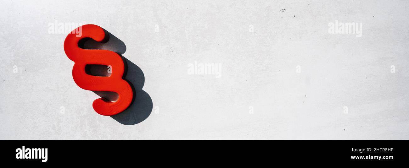 Paragraph / section sign - Symbol of Law and Justice on concrete ...