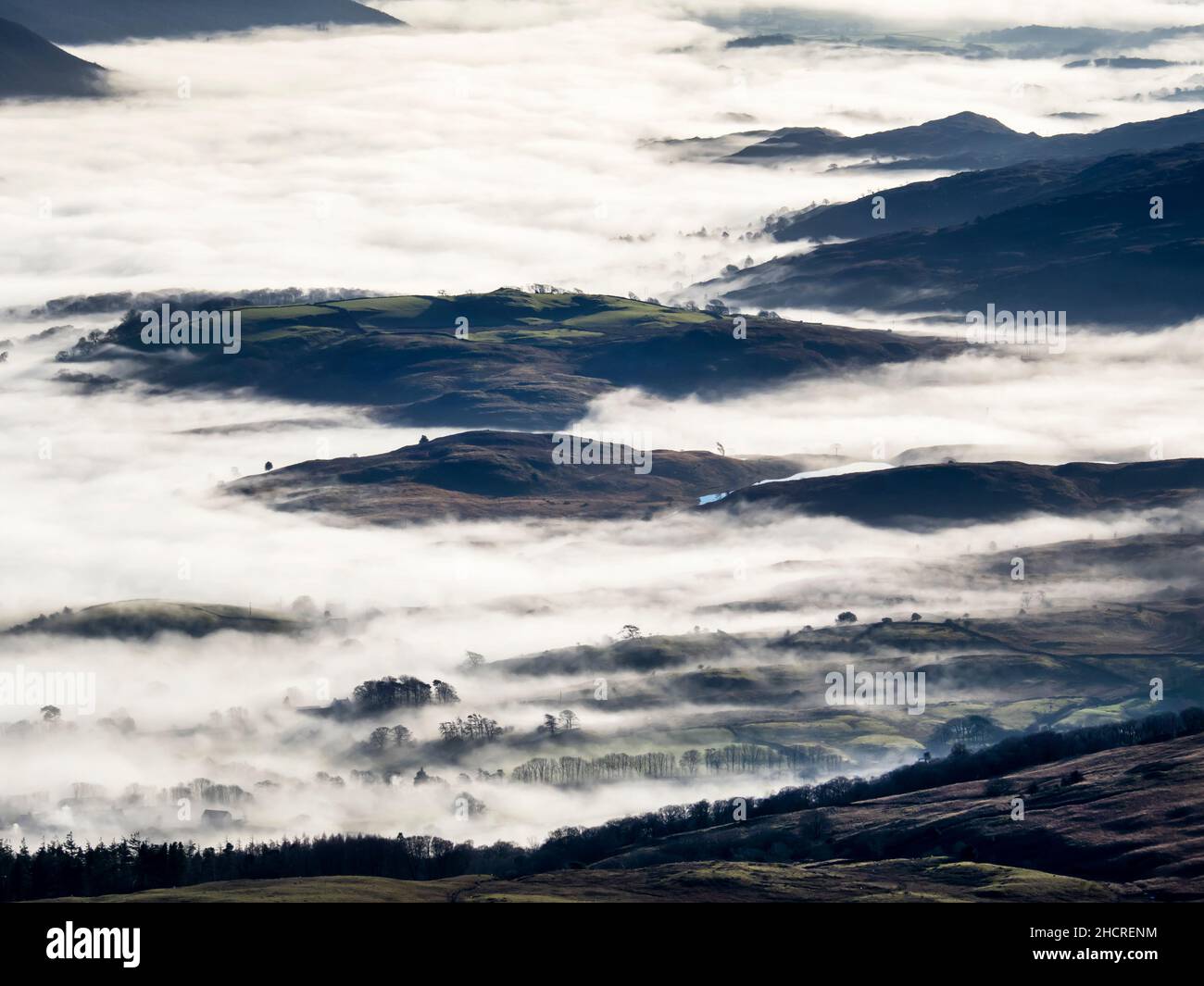 Looking down on Beacon Tarn on Torver Common from the Coniston fells ...
