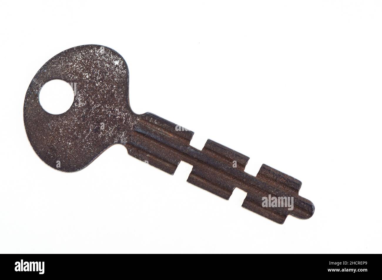 Old rusty key isolated on a white background Stock Photo - Alamy