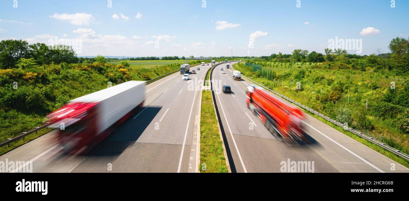 Highway transportation with cars and Truck Stock Photo - Alamy