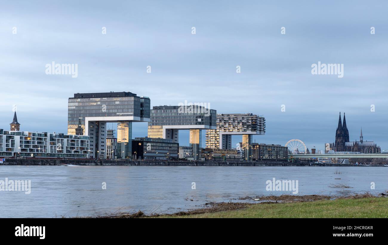 Crane houses as modern part of Cologne urban skyline in winter twilight ...