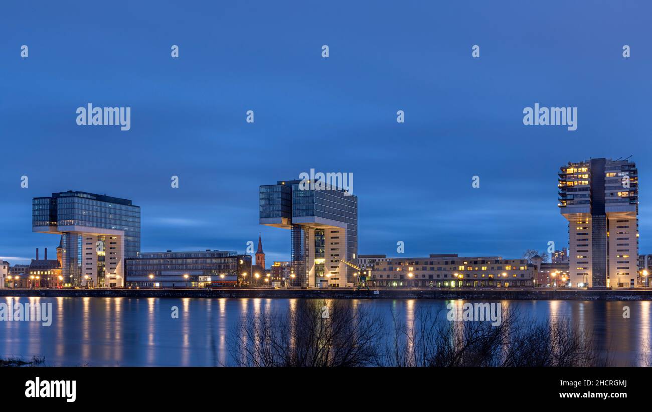 Crane houses as modern part of Cologne urban skyline in winter twilight ...
