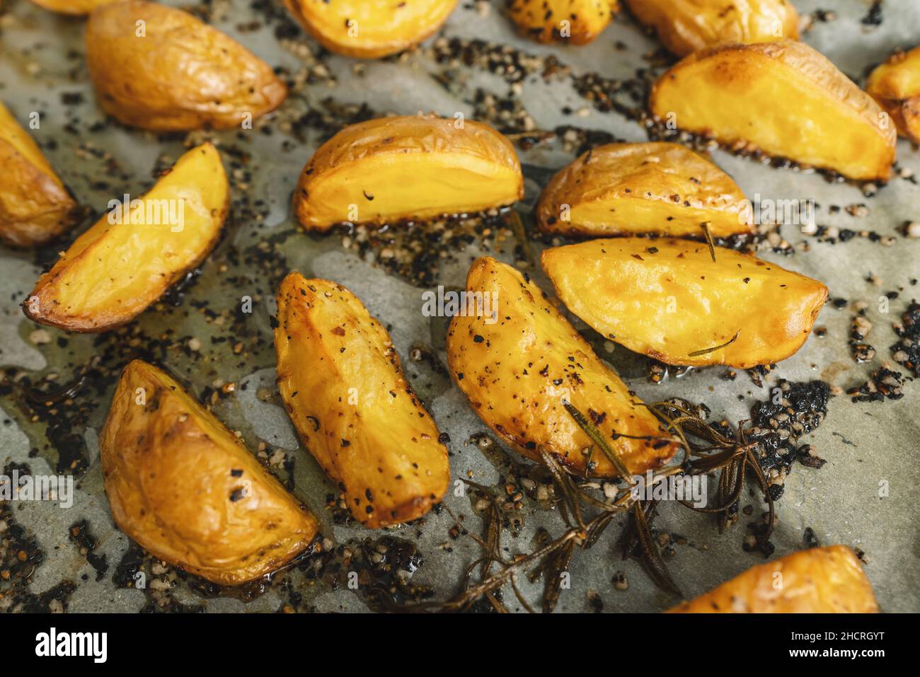 Baked potato wedges with rosemary and oil - homemade organic vegetable ...