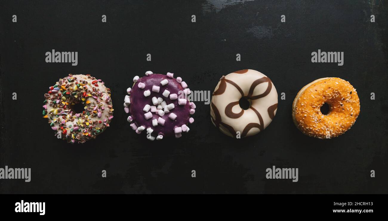 Donuts row hi-res stock photography and images - Alamy