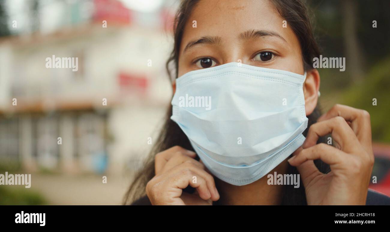 Indian female with a mask in the city on a sunny day Stock Photo - Alamy