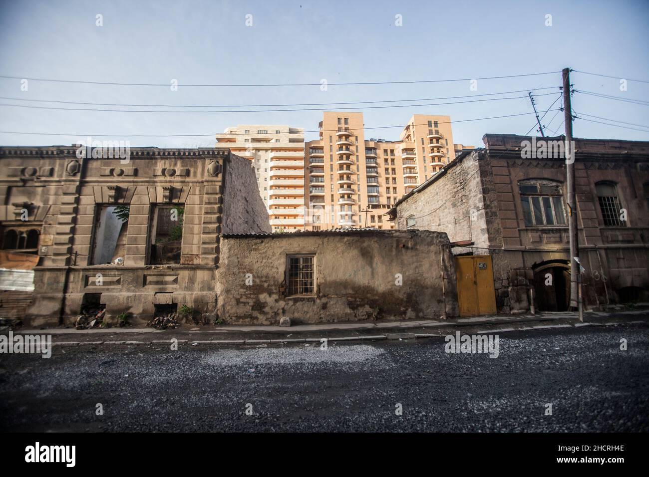 Ancient streets and buildings against the cloudy sky in Yerevan ...