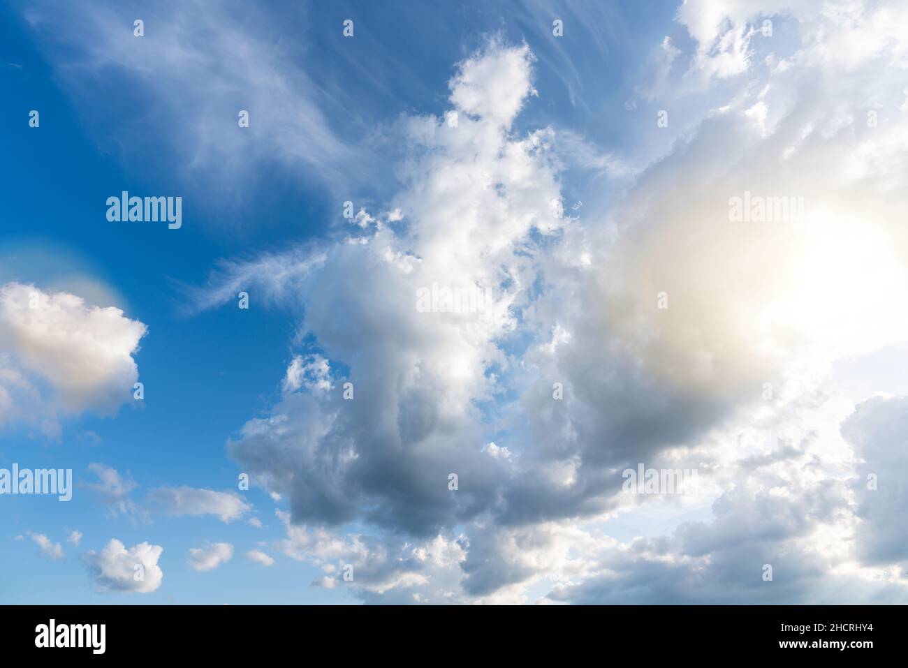 Sun beams or light rays breaking through the clouds Stock Photo - Alamy