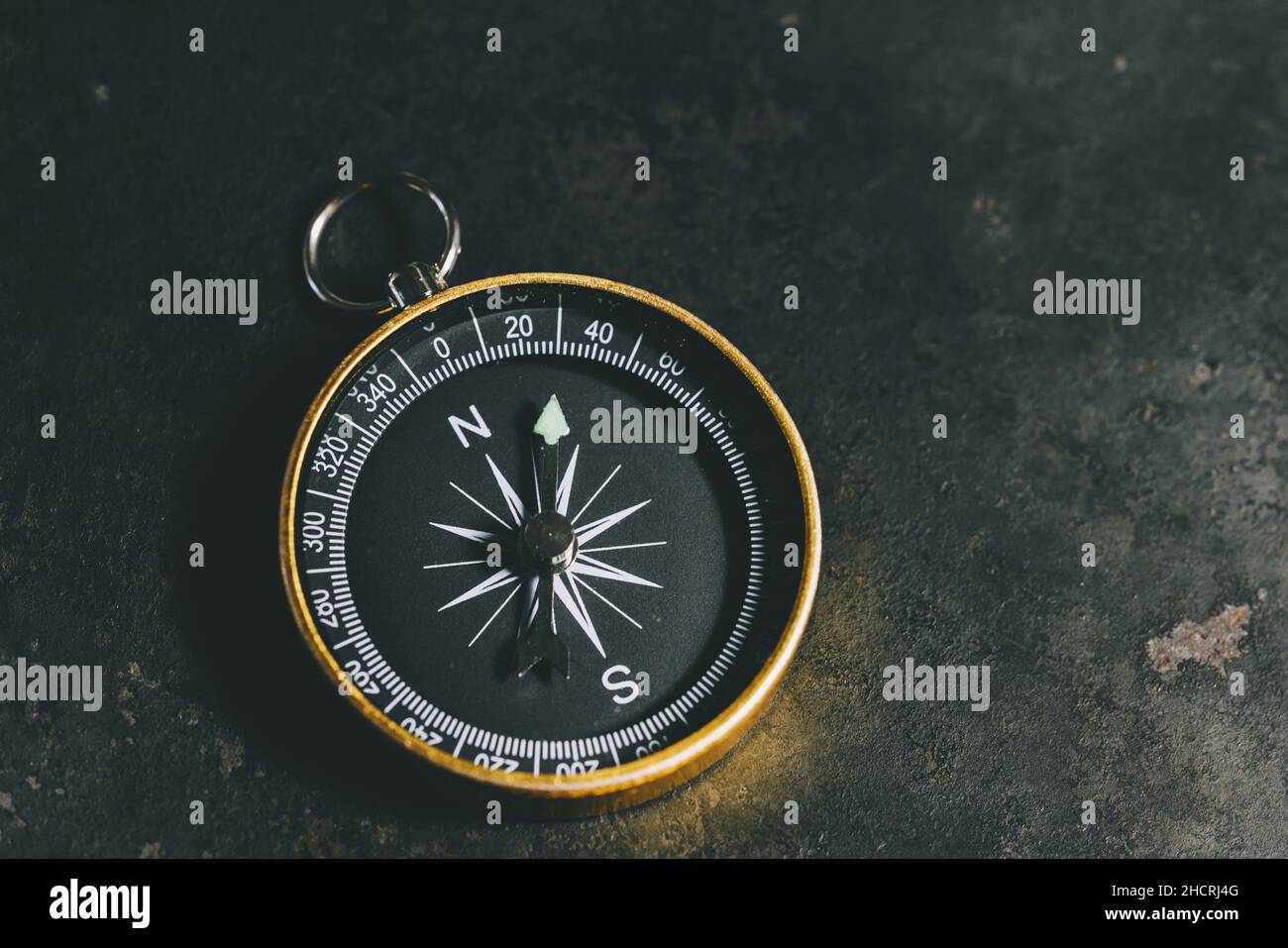 compass on a table concept for direction, travel, guidance or ...