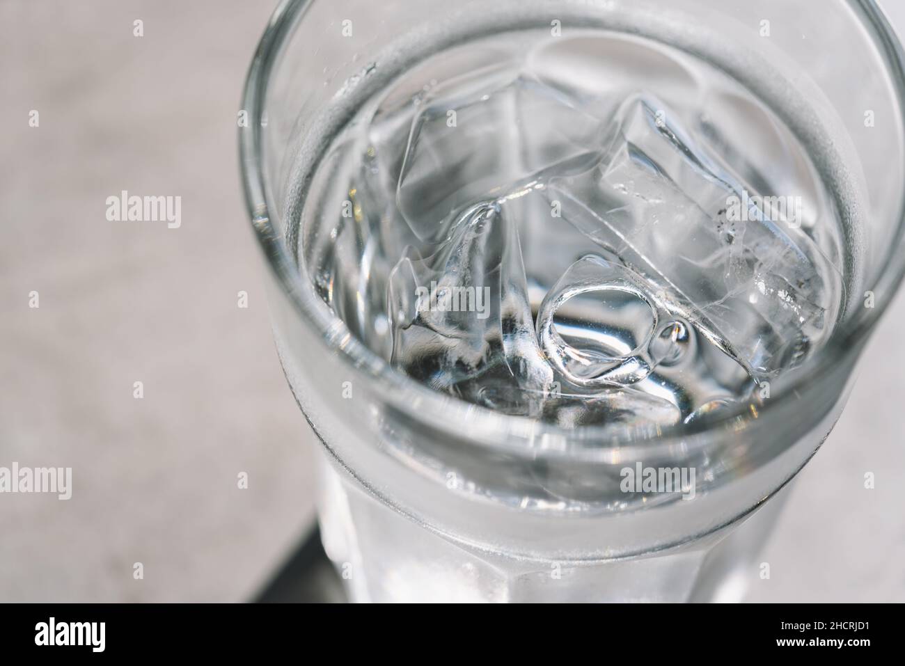 Glass with ice cubes Stock Photo - Alamy