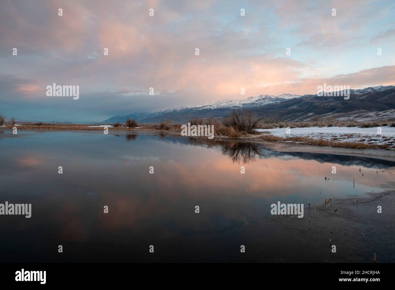 The Eastern Sierra peaks above Bishop, Inyo County, CA, USA light up ...