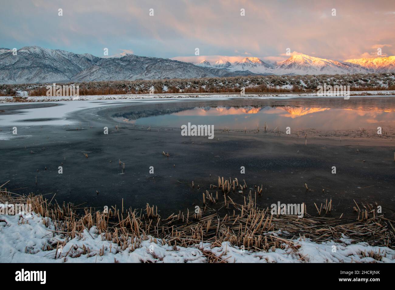The Eastern Sierra peaks above Bishop, Inyo County, CA, USA light up ...