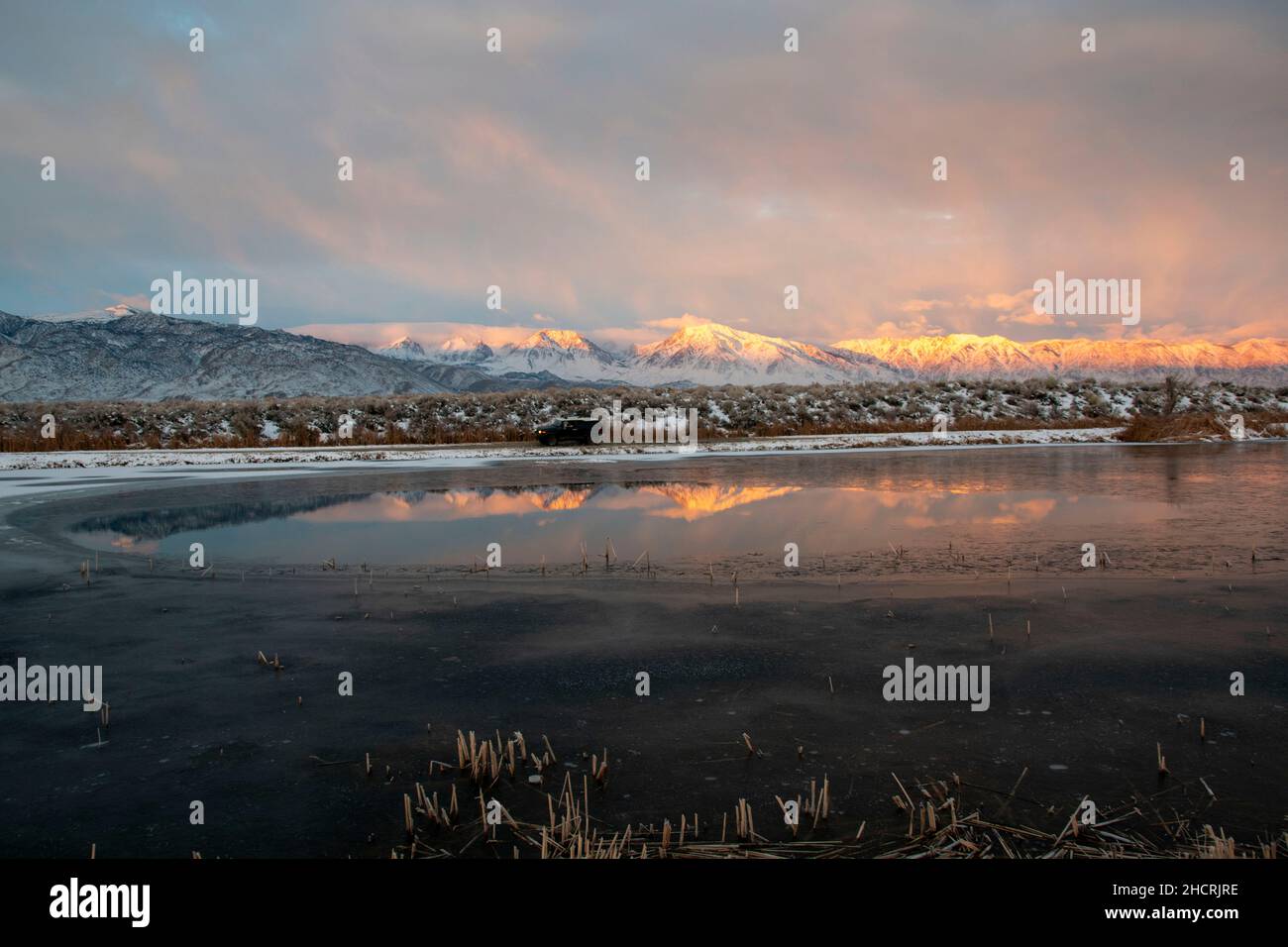 The Eastern Sierra peaks above Bishop, Inyo County, CA, USA light up ...