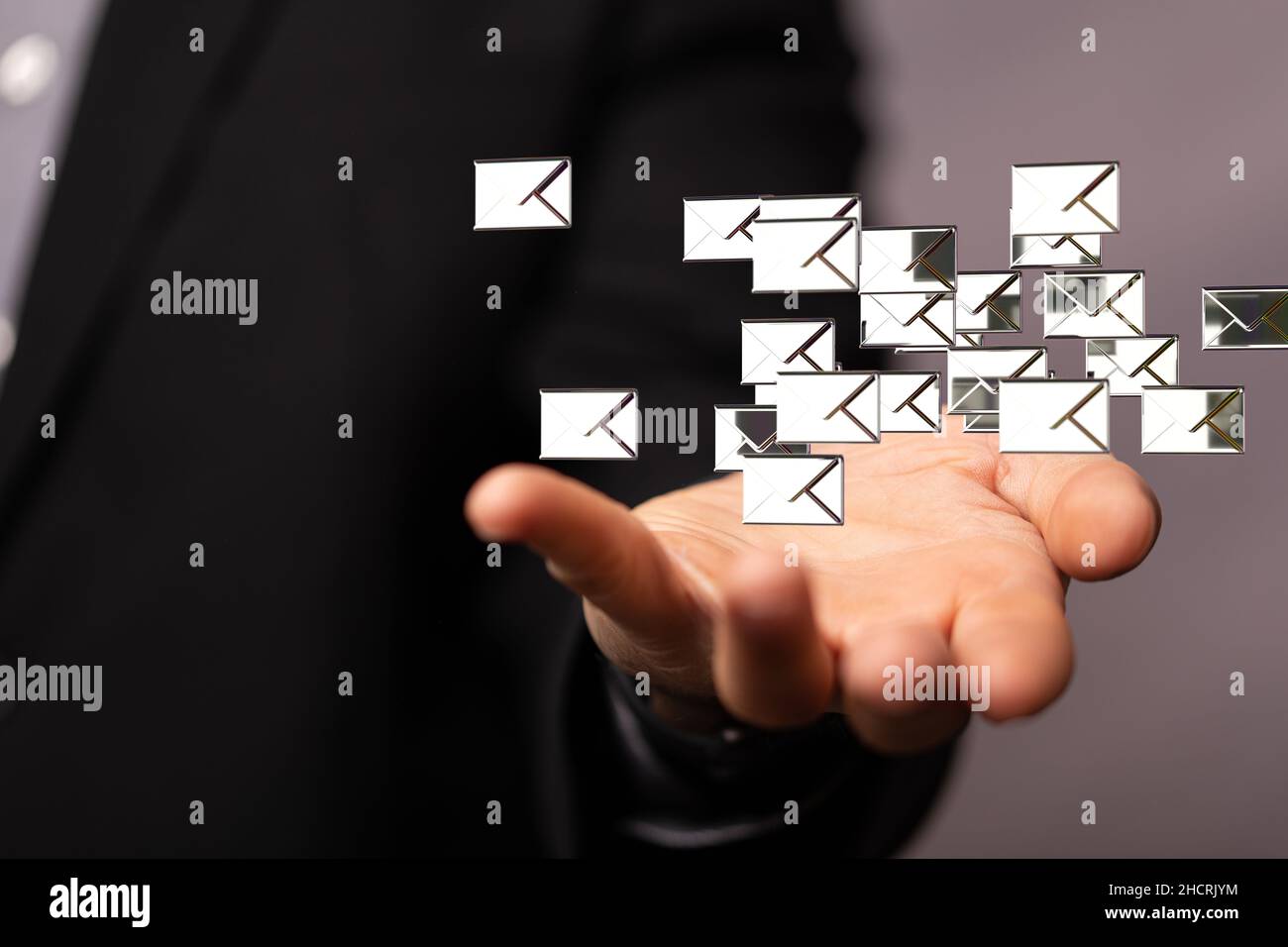 3D rendering of email icon concept in hand background Stock Photo - Alamy