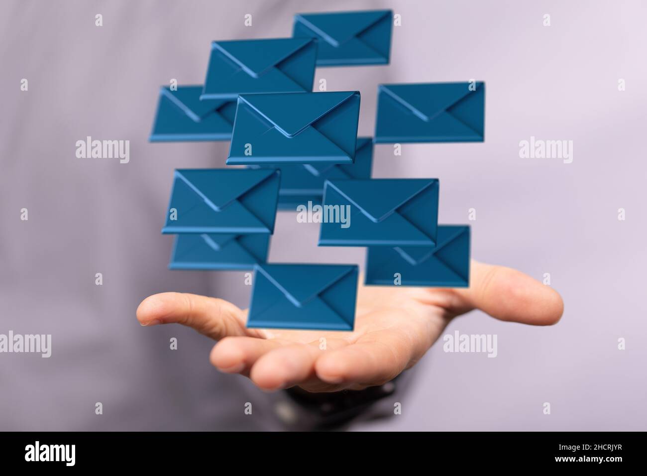 3D rendering of email icon concept in hand background Stock Photo - Alamy
