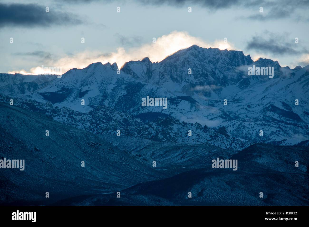 The Eastern Sierra peaks above Bishop, Inyo County, CA, USA light up ...