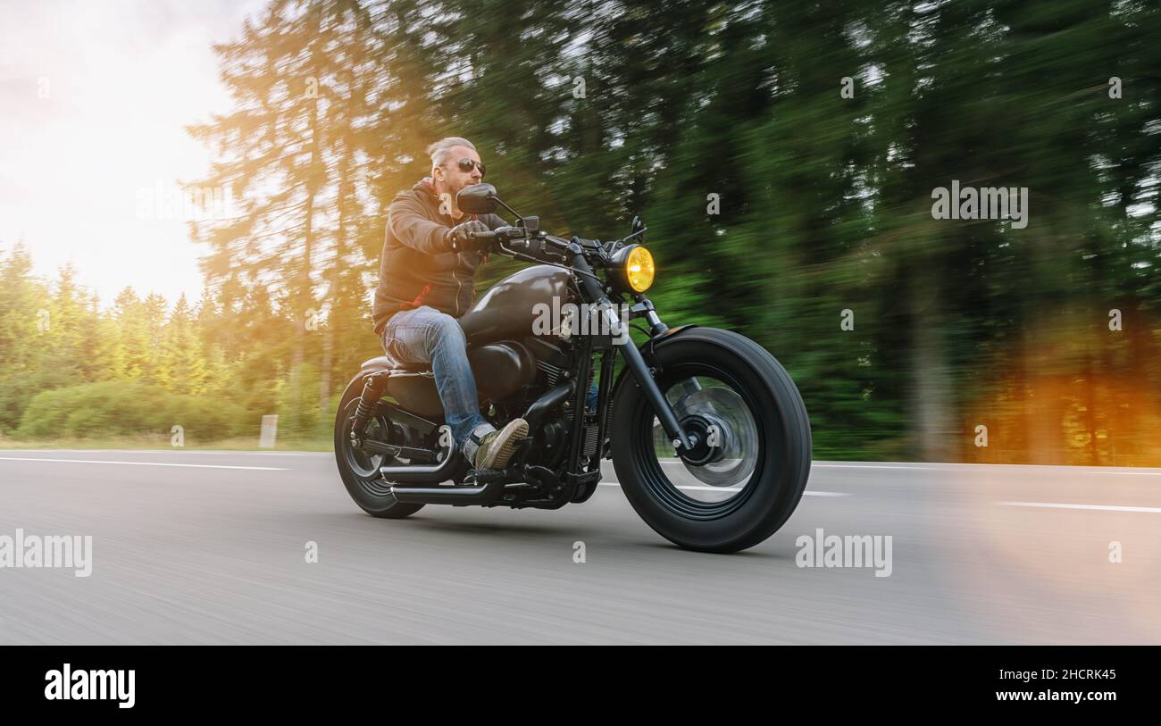 Man riding cafe racer motorcycle hi-res stock photography and images ...