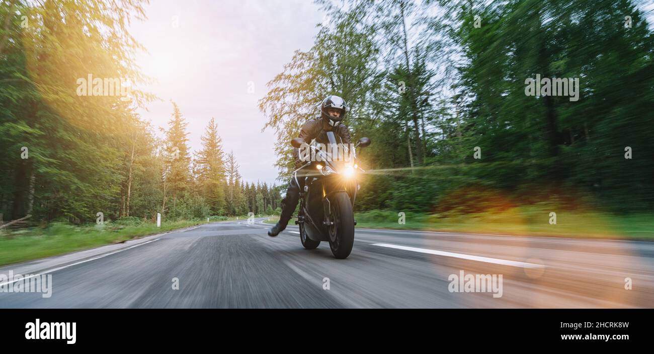 Motorcyclist racing motorcycle on country hi-res stock photography and ...