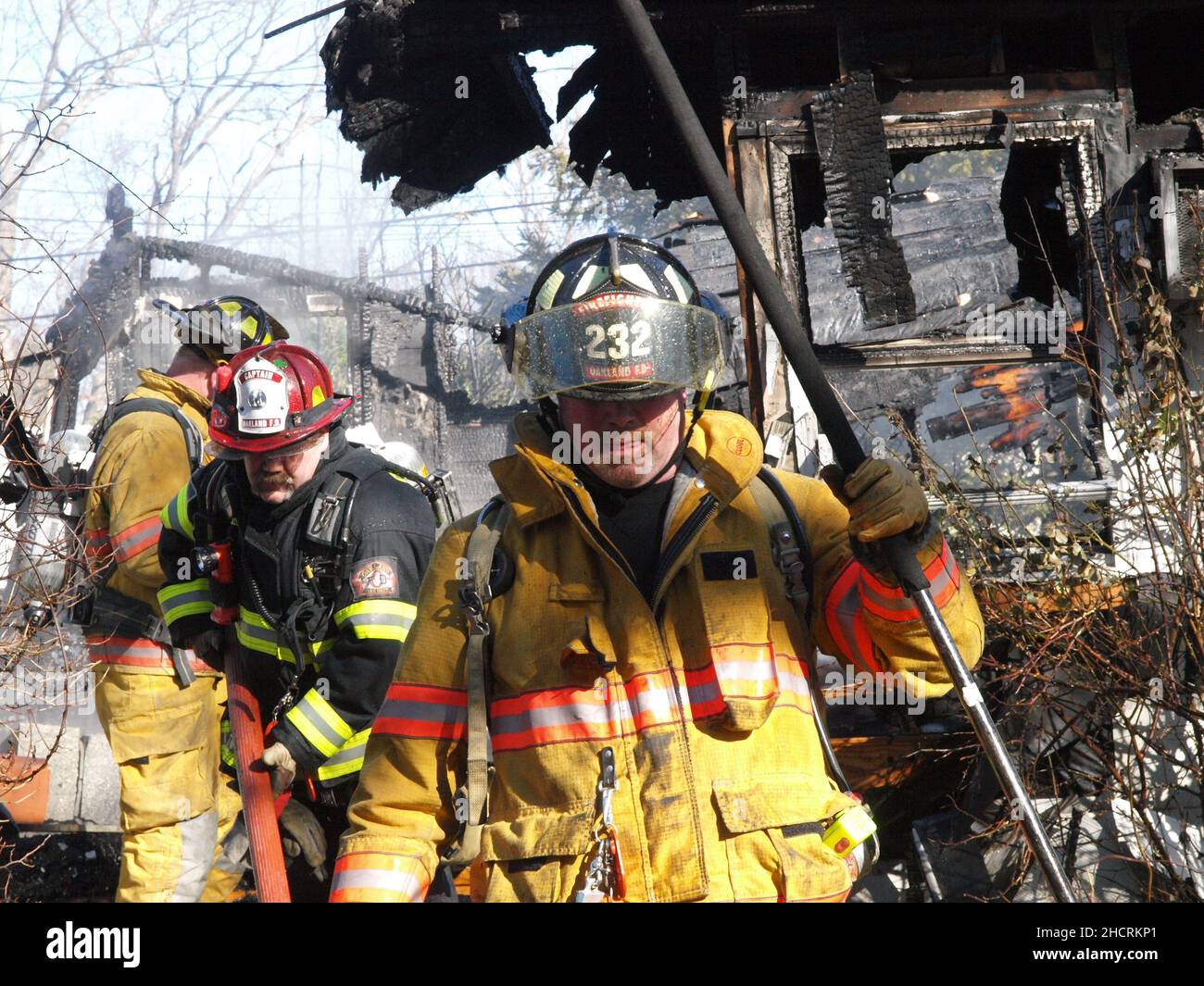 Aftermath of house fire, overhaul operations Stock Photo - Alamy
